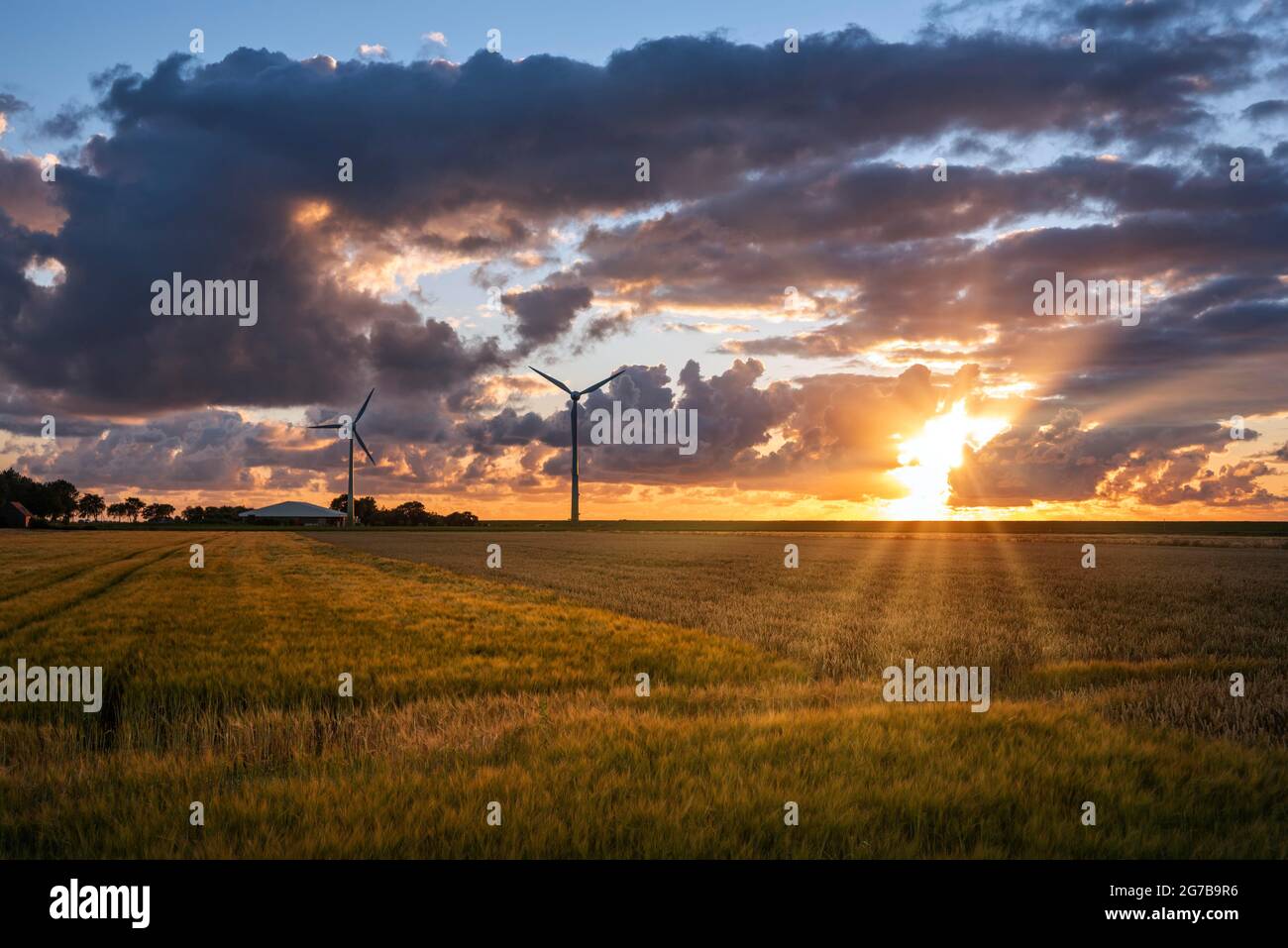 Cloudy atmosphere, wind farm near Neuharlingersiel, Lower Saxony ...