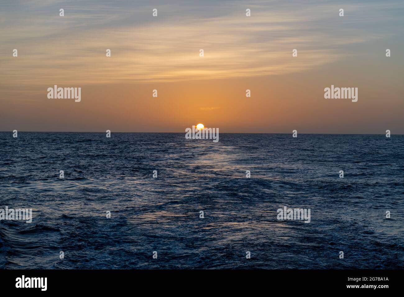 Beautiful seascape - waves and sky with clouds with beautiful lighting ...