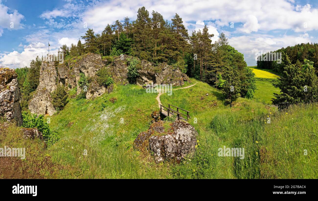 Franconian rock landscape with hiking trail, on the left rock tower ...