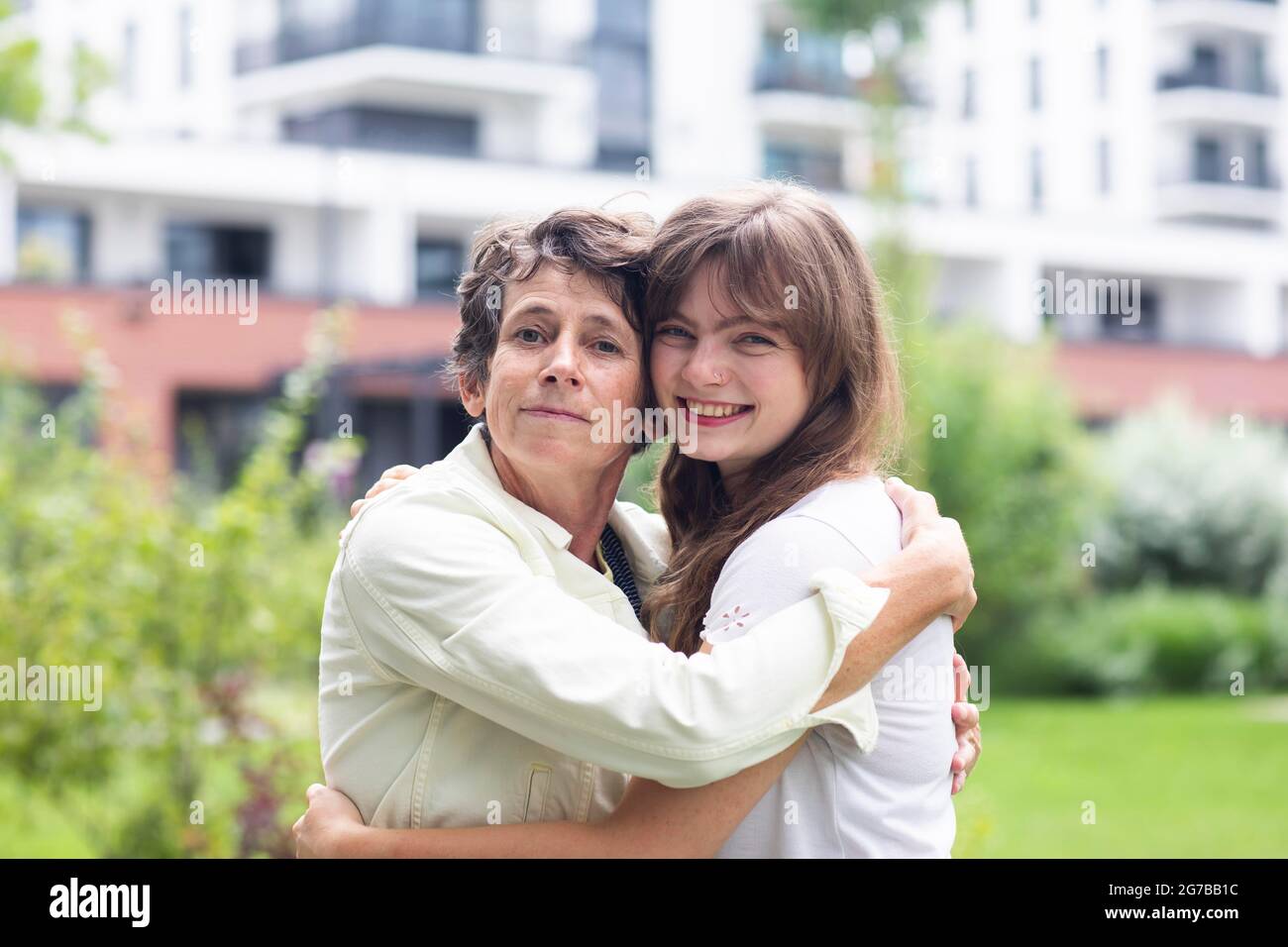 Mother and daughter hugging, Germany Stock Photo - Alamy