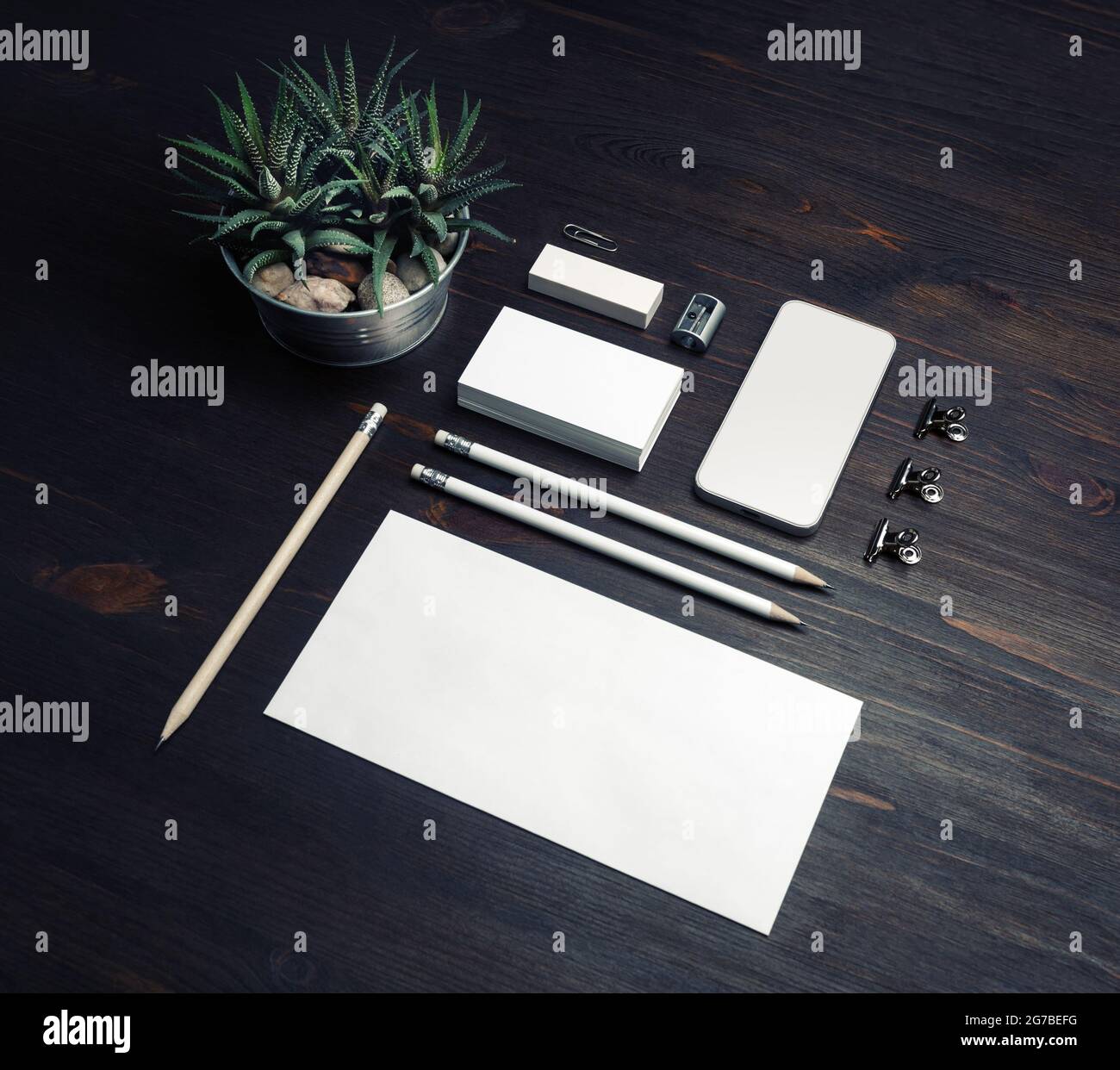 Blank corporate stationery on wood table background. Template for ...