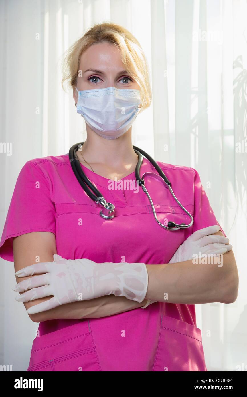 Portrait of a modern doctor girl. Young girl doctor in her office ...