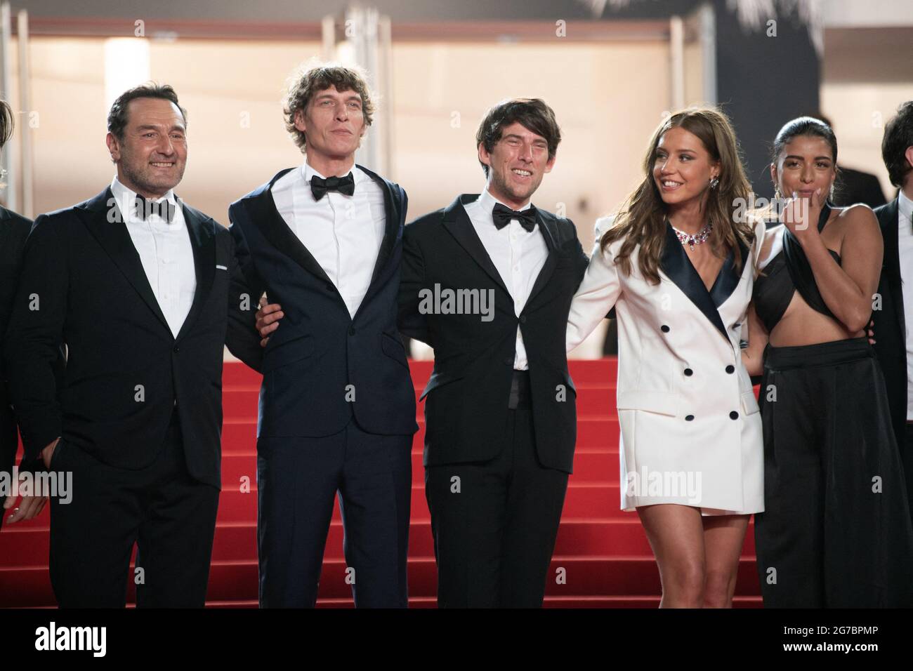 Cannes, France. 12th July, 2021. Gilles Lellouche, Cedric Jimenez, Hugo ...