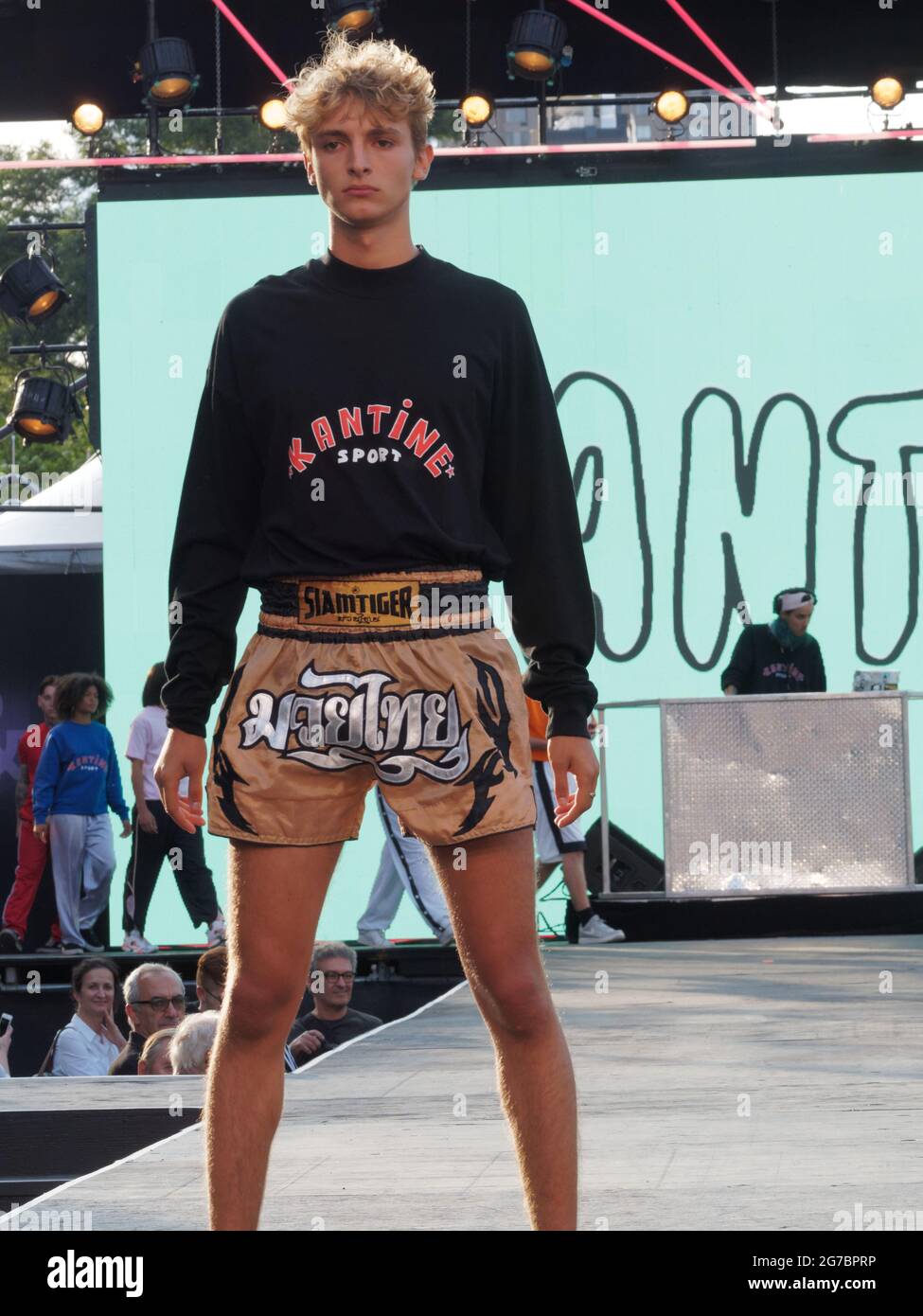 A male model poses on the runway at the Kantine Club fashion show held ...