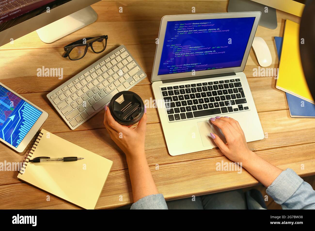 Female programmer working in office at night Stock Photo - Alamy