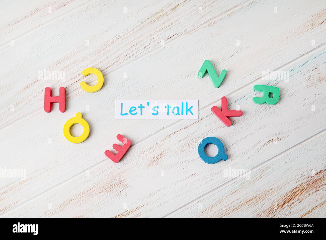 Paper with text LET'S TALK and letters on white wooden background Stock ...