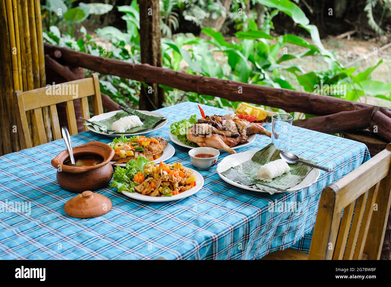 Thai-style lunch set for two people in resort somewhere Stock Photo - Alamy