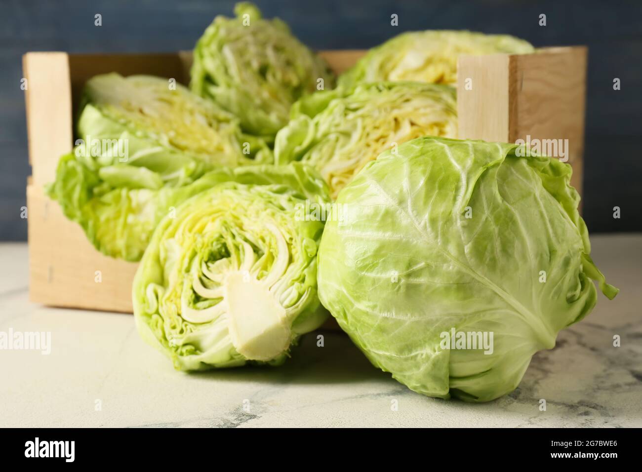 Fresh cabbage on light table Stock Photo - Alamy