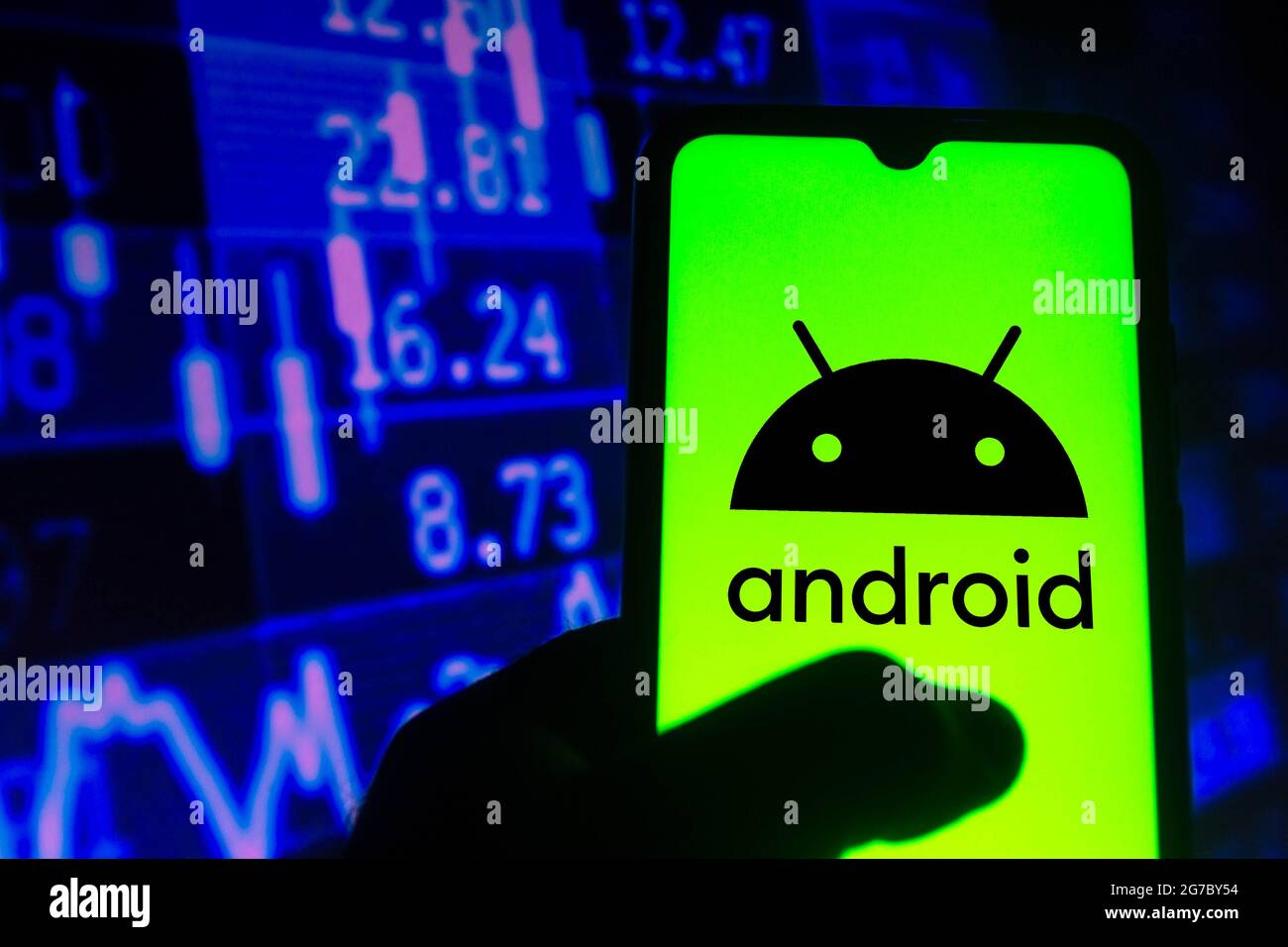 In this photo illustration the Android logo seen displayed on a ...
