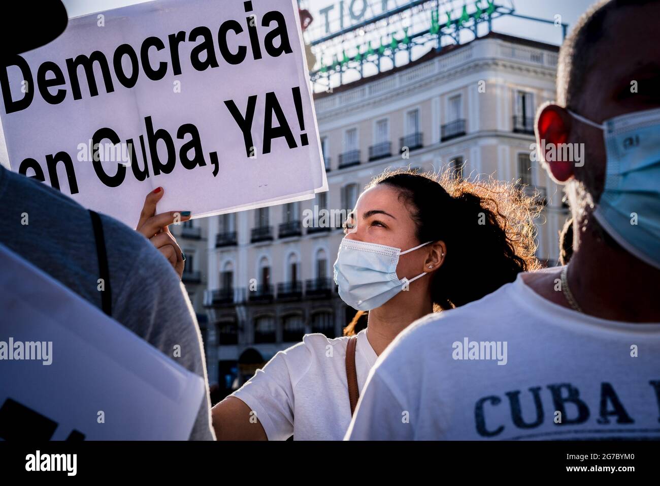 A protester holds a placard during the demonstration.The Cuban ...