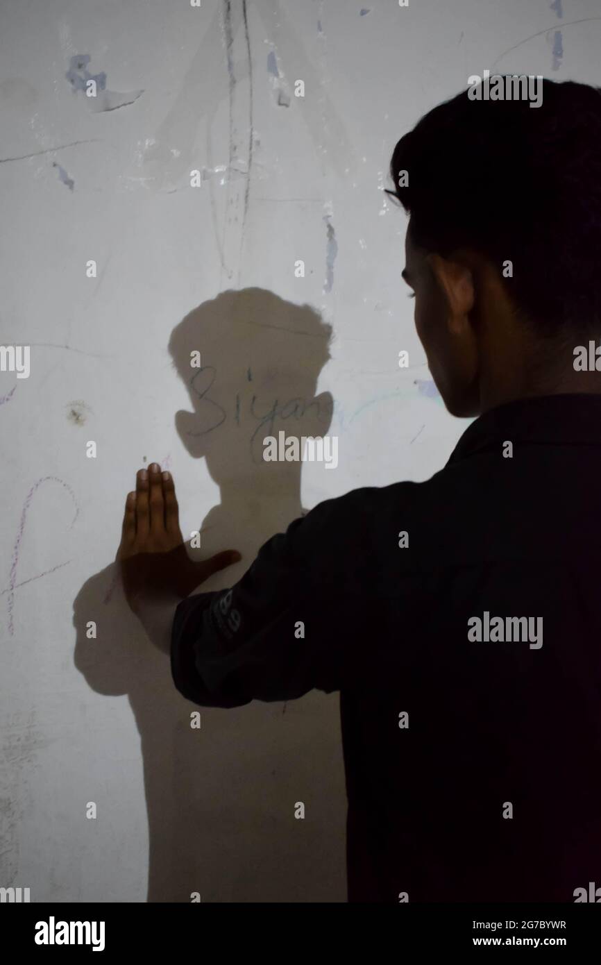 Man and his shadow Stock Photo - Alamy