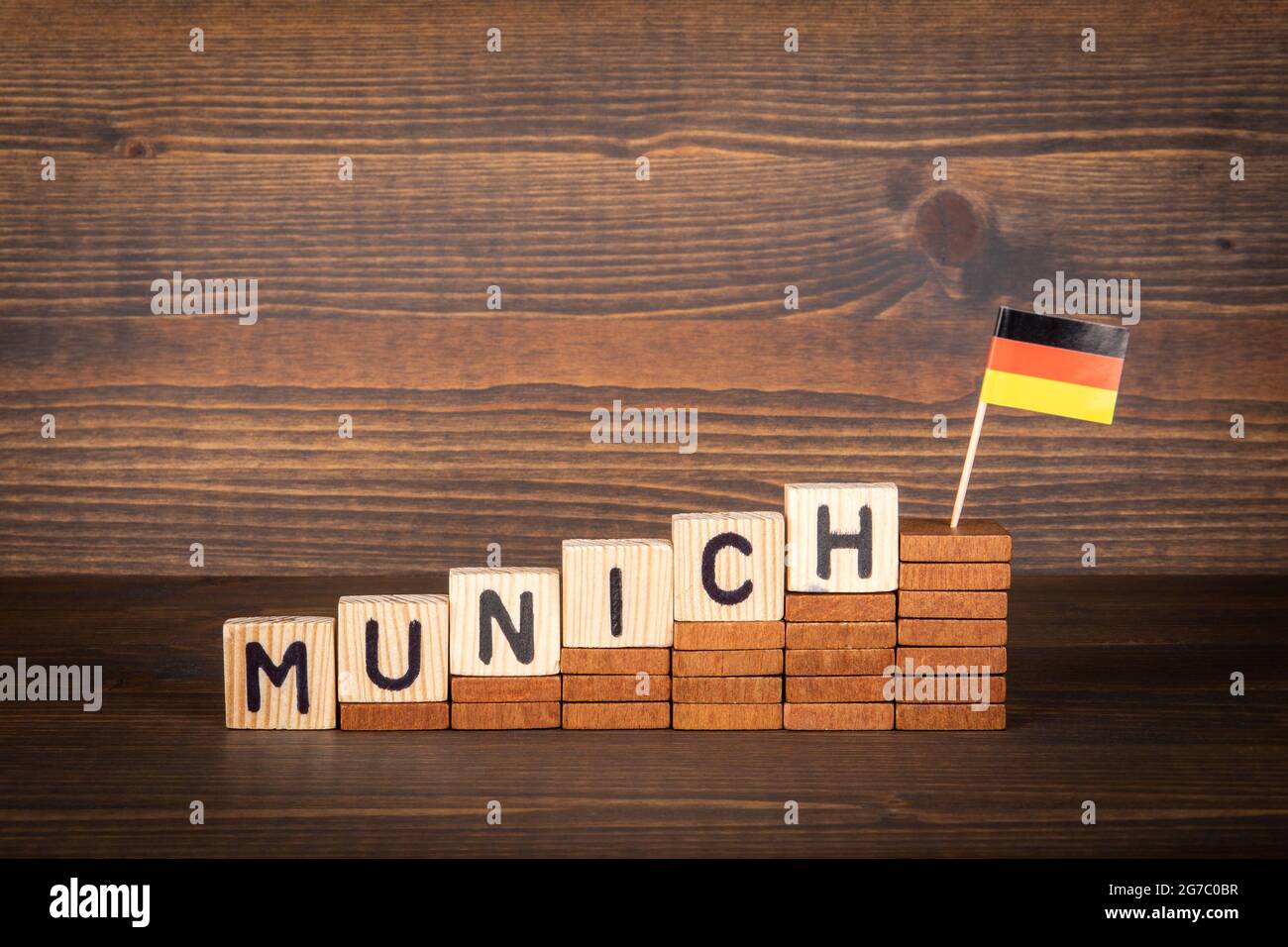MUNICH city in germany. Wooden alphabet letters and German flag on a ...