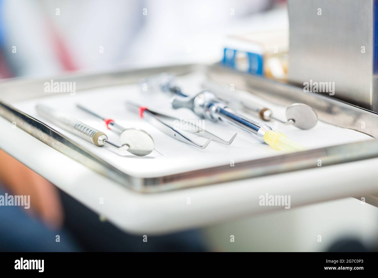 Sterile tools or medical instruments for a dentist, mirrors, tweezers ...