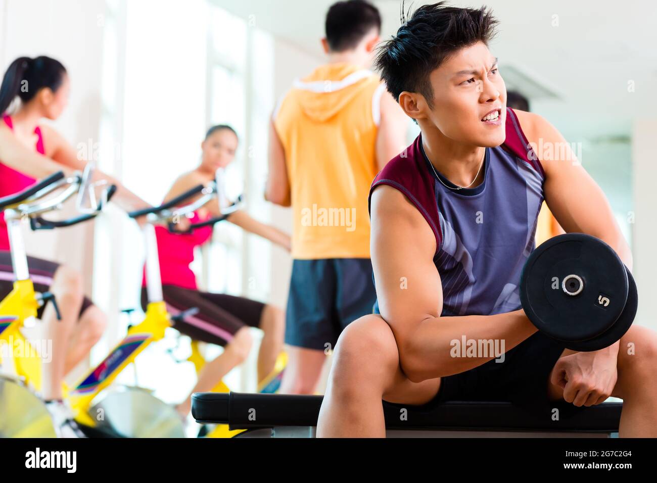 Chinese Asian group of men and woman doing sport exercise or training ...