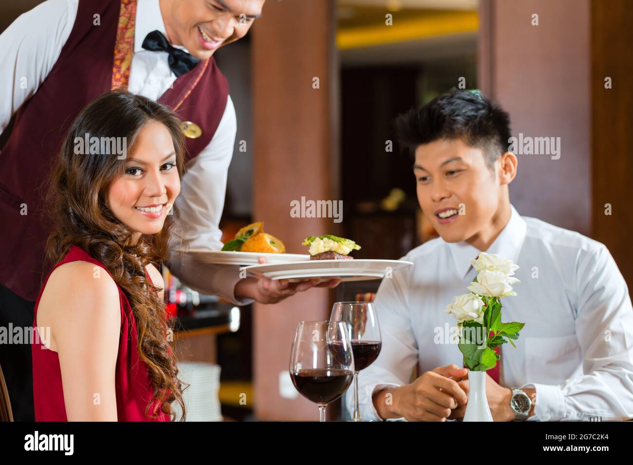 Fancy dinner waiter hi-res stock photography and images - Alamy