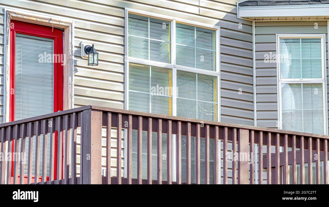 Pano Residential building with small balcony accessed through glass ...