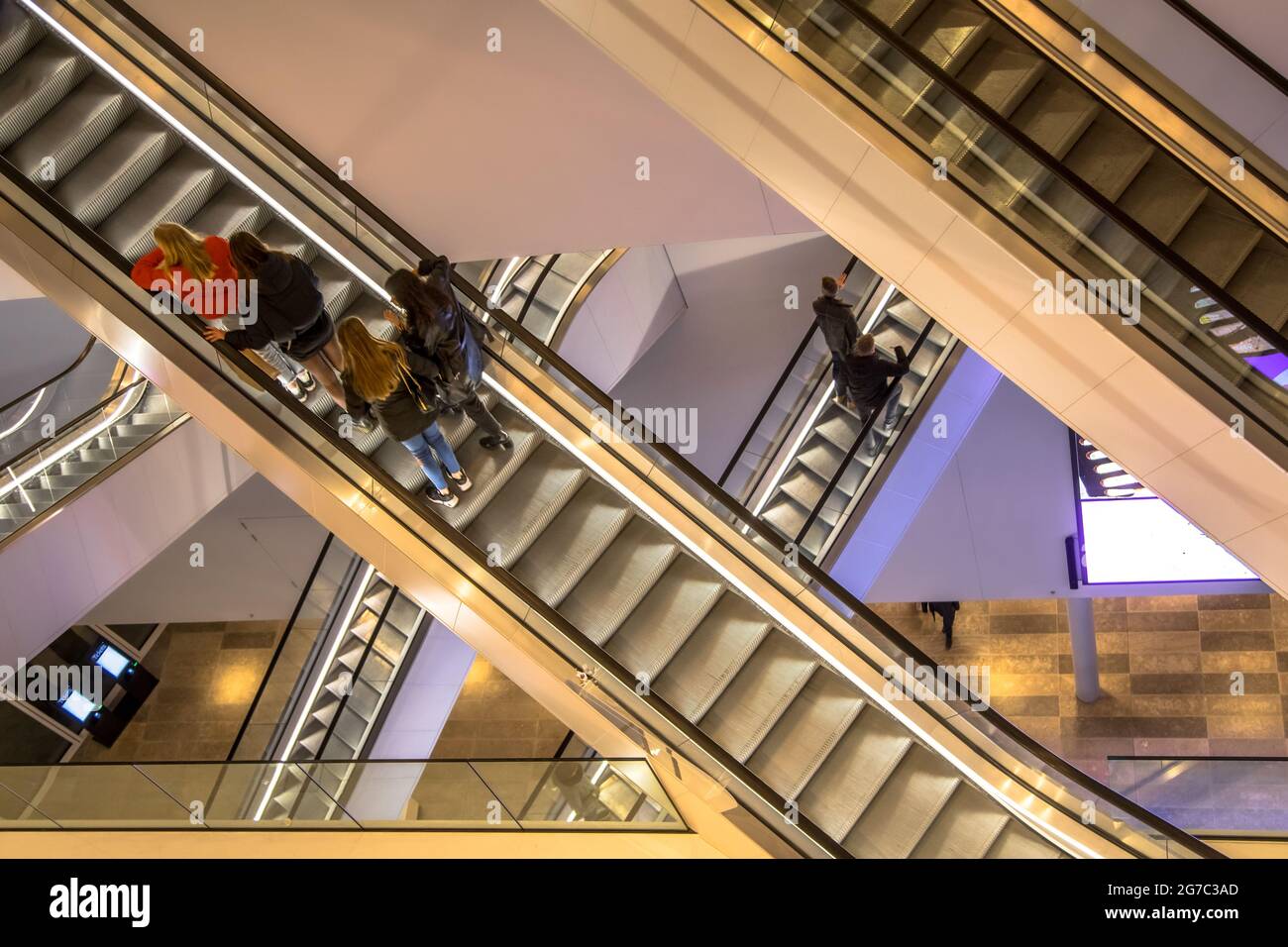 Escalators with people in modern public library seen from above Stock ...