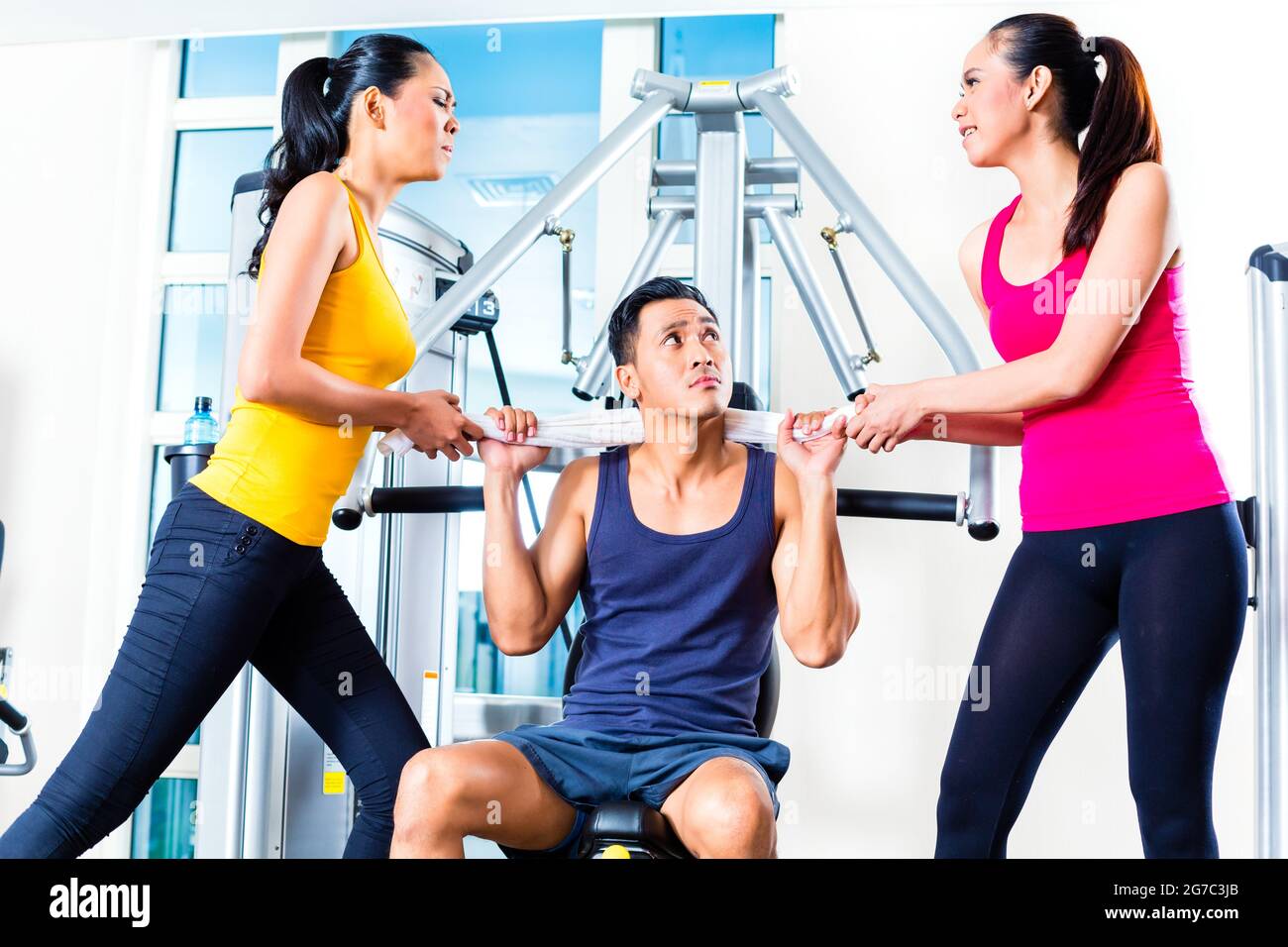 Women fighting over man at gym Stock Photo - Alamy