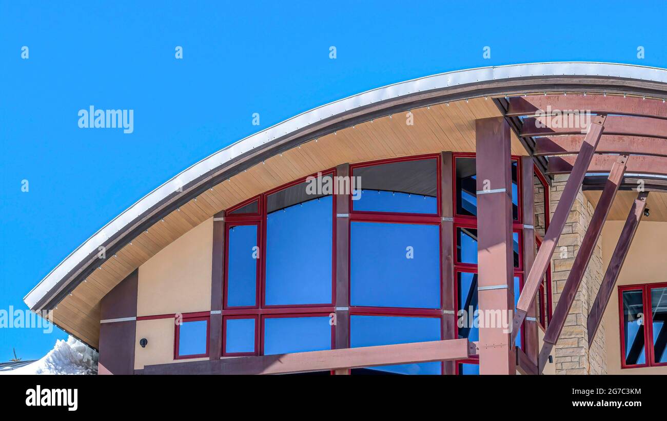 Pano Home exterior with modern design featuring curved roof and large ...