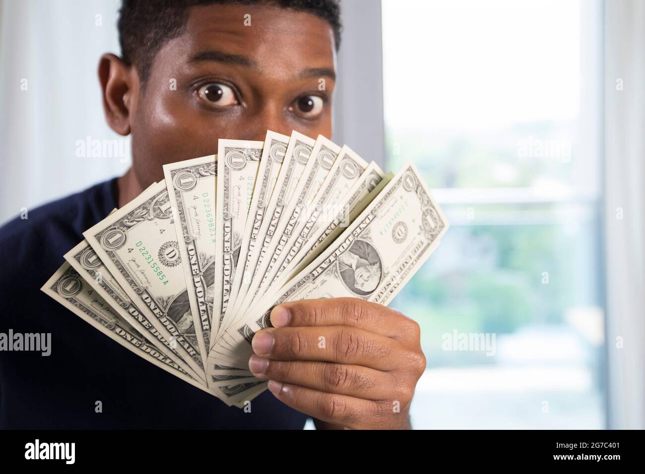 Black Hands Holding Money