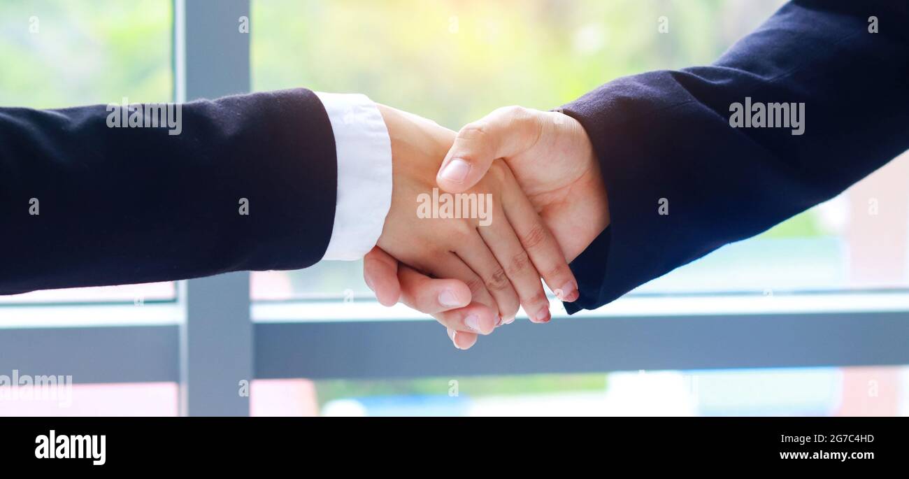 Businessmen shaking hand concept teamwork hi-res stock photography and ...