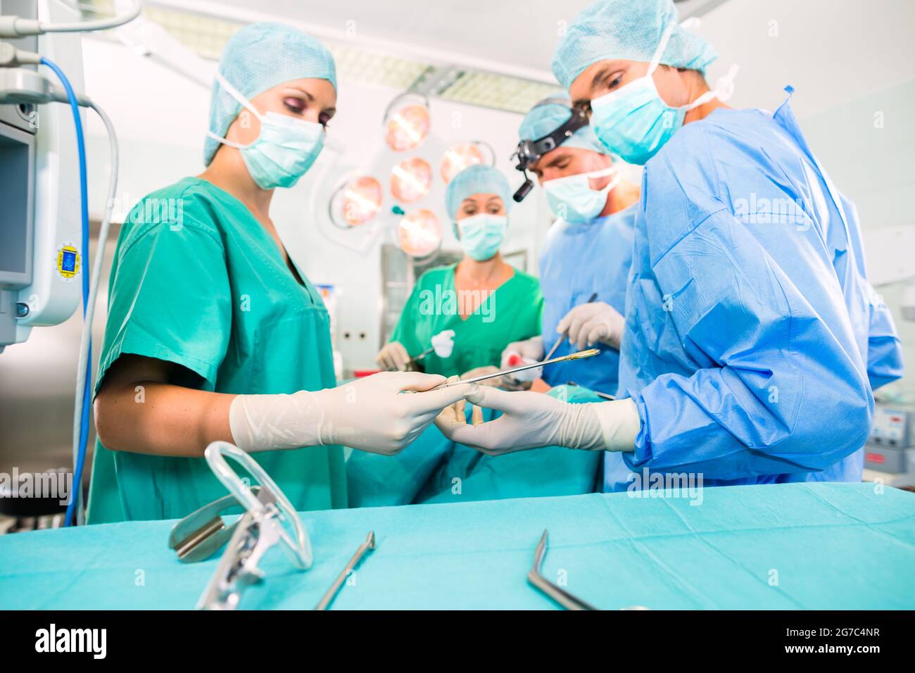 Hospital - surgery team in the operating room or Op of clinic operating ...