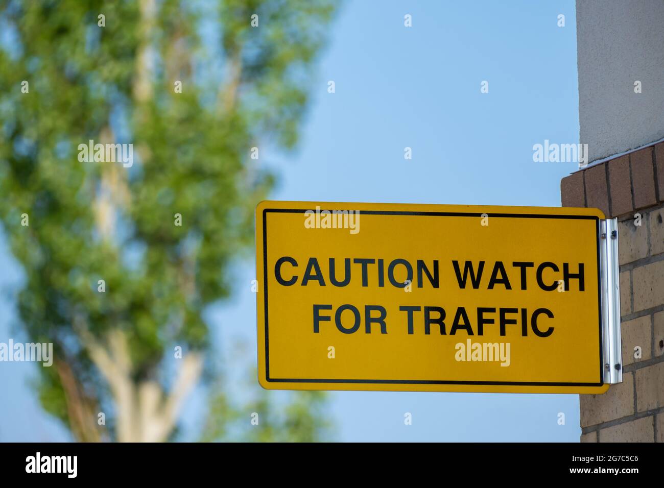 Caution Warning Sign at fast food restaurant drive thru Stock Photo - Alamy