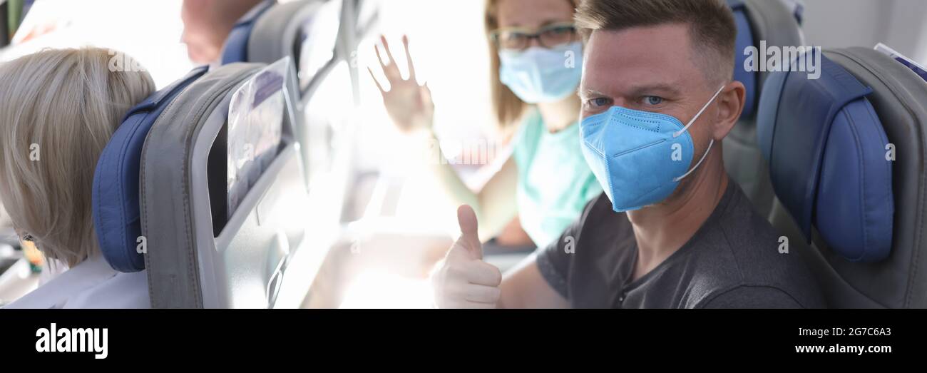 Masks on plane hi-res stock photography and images - Alamy