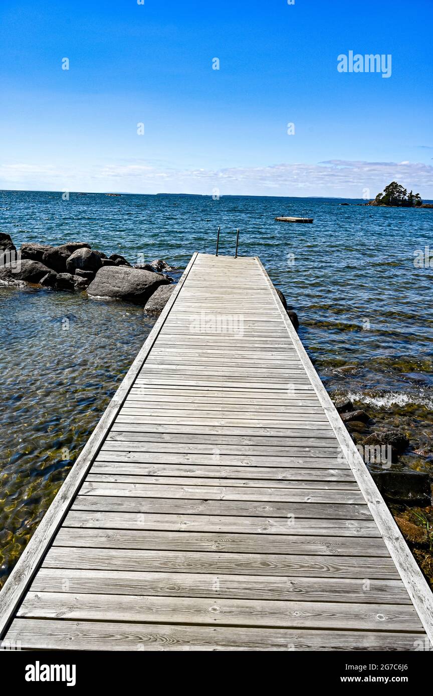jetty with bathing ladder in lake Vattern Sweden Stock Photo - Alamy