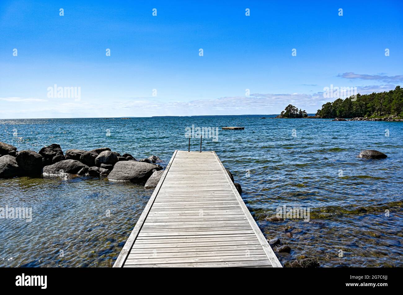 jetty with bathing ladder in lake Vattern Sweden Stock Photo - Alamy