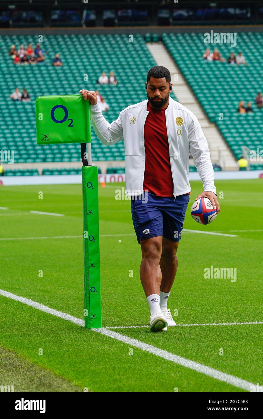 England wing Joe Cokanasiga walks around the pitch before the England ...
