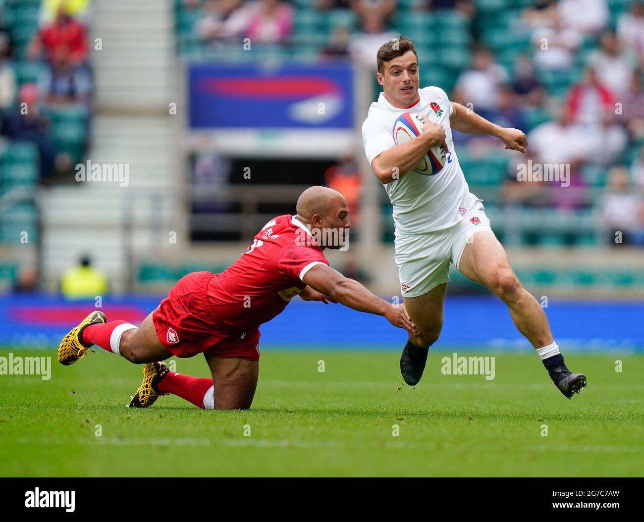 England wing Adam Radwan breaks past Rugby Canada wing Cole Davis ...