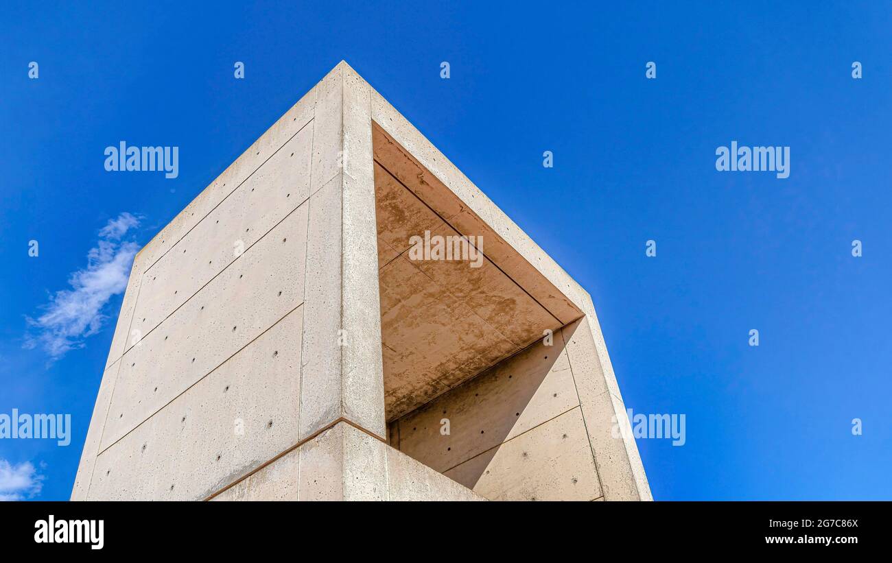 Pano Exterior of building with vibrant blue sky background in San Diego ...