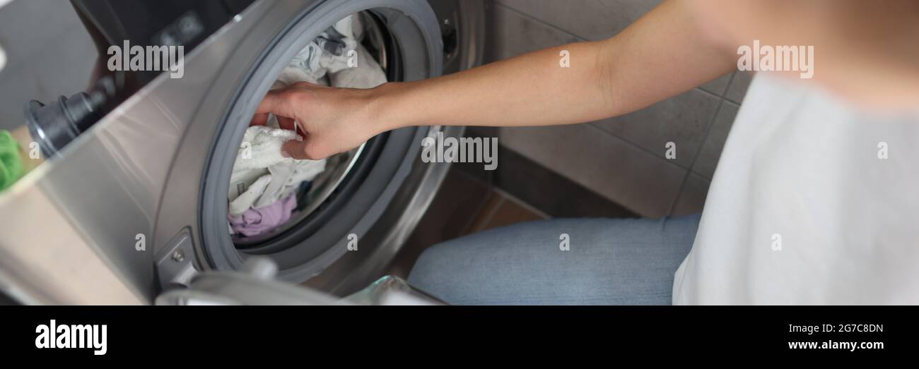 Washing machine is loaded with laundry for washing Stock Photo - Alamy