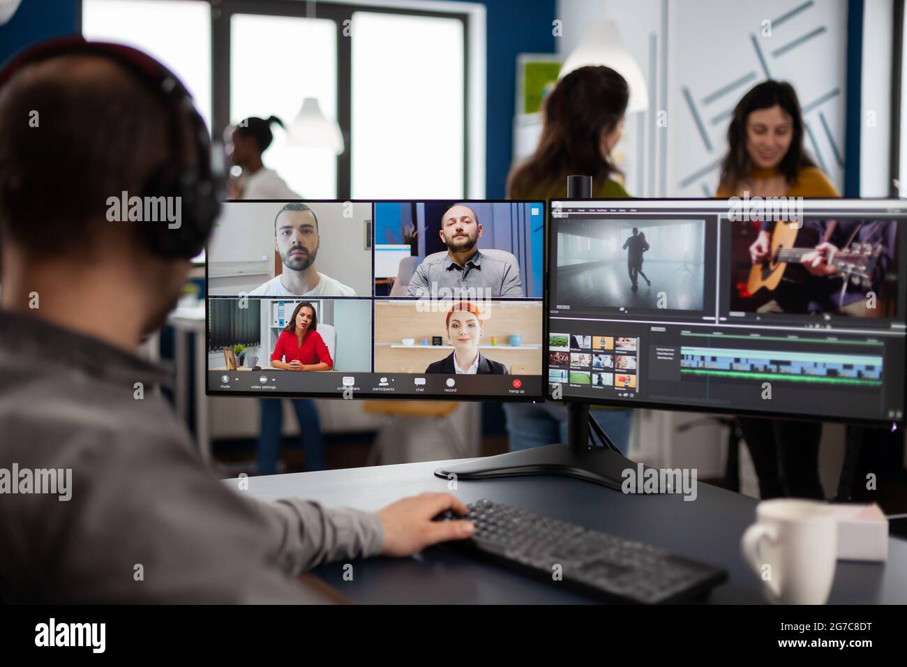 Project manager in web online meeting with team on video call editing ...