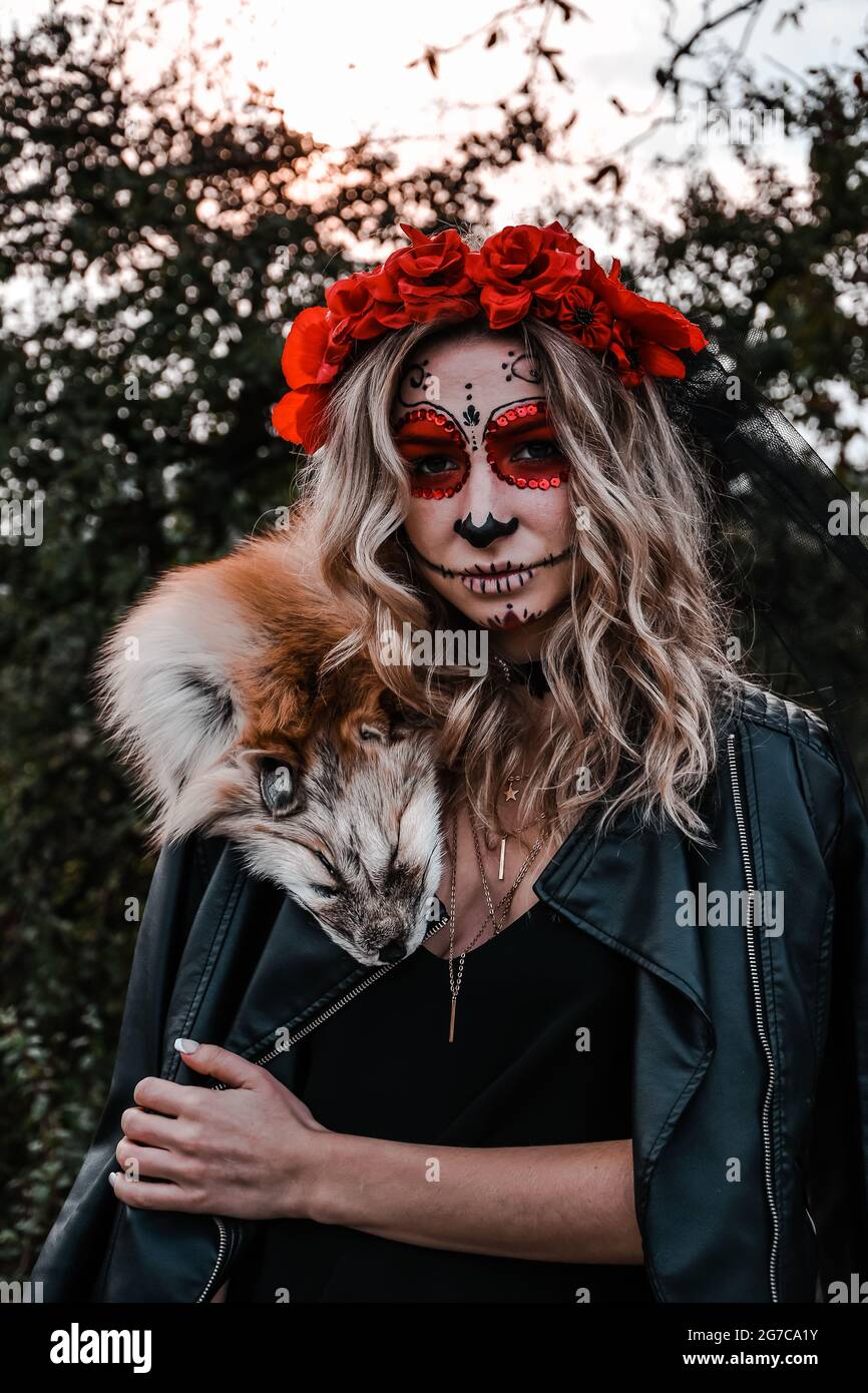 Happy Halloween concept. Scared horrible female sitting in special ...