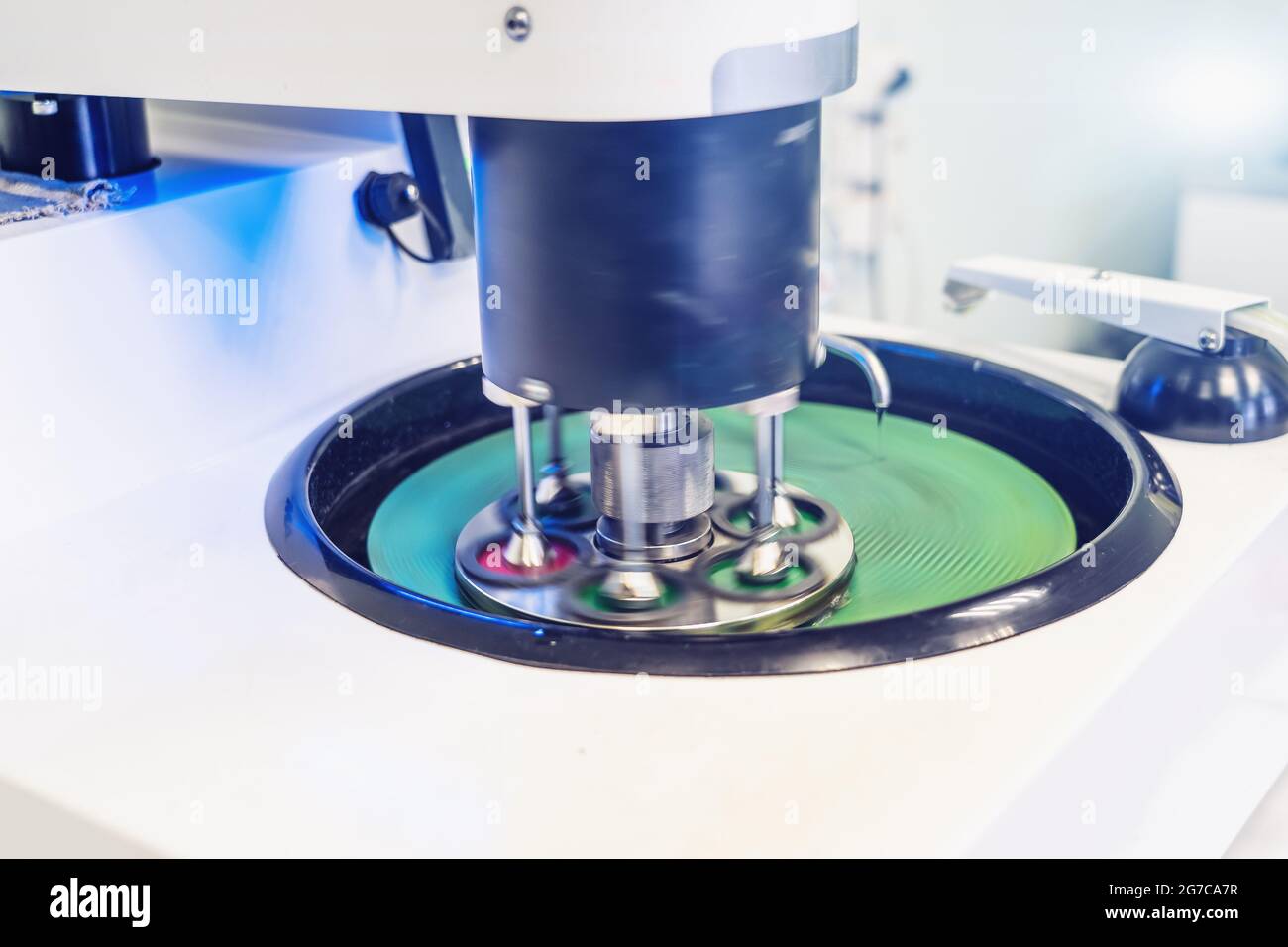 Rotating centrifuge at lab, analysis automated technology equipment at ...