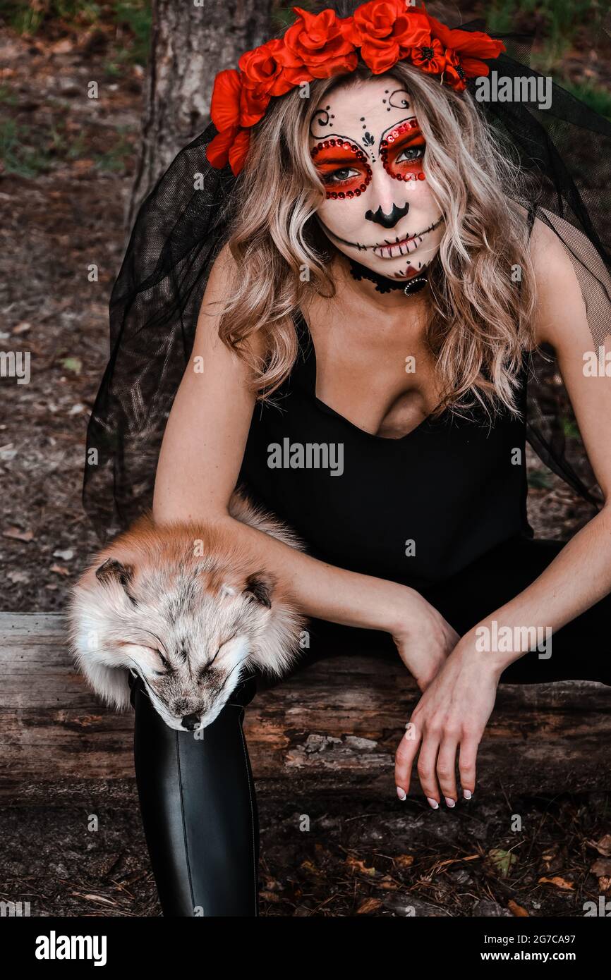 Happy Halloween concept. Scared horrible female sitting in special ...