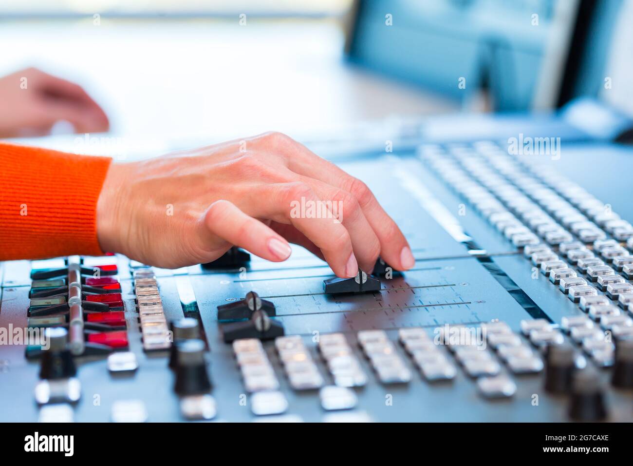 female Presenter in radio station hosting show for radio live in Studio ...