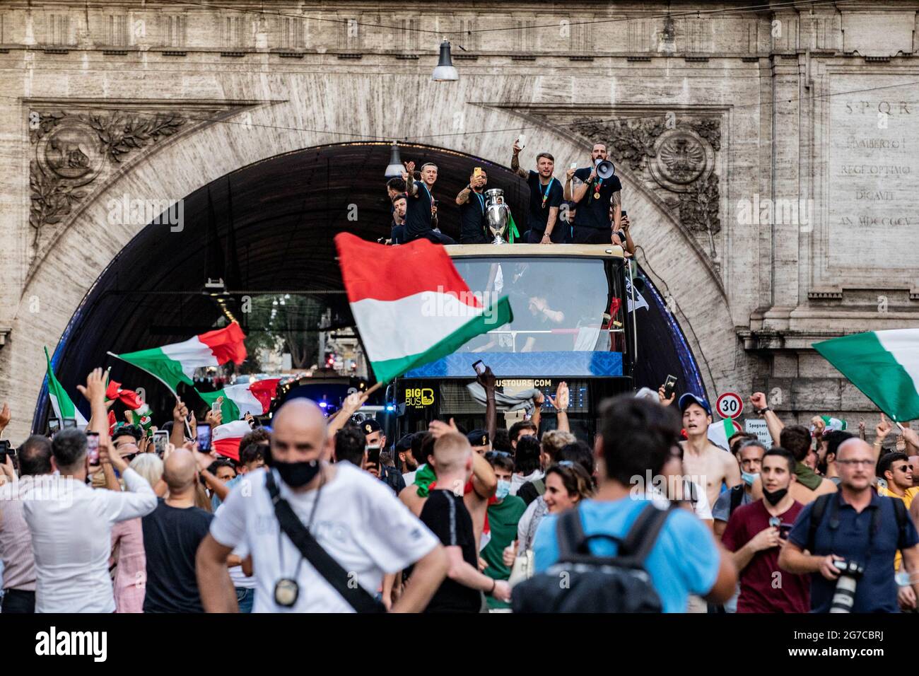 Rome, The open-top coach of the Italian National team passes in via del ...
