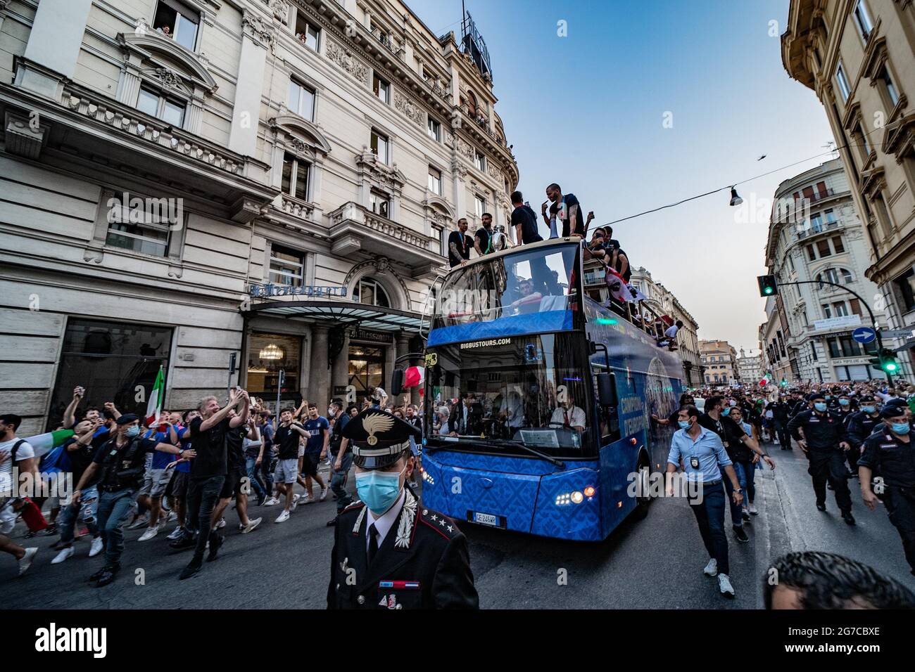 Rome, The open-top coach of the Italian National team passes in via del ...