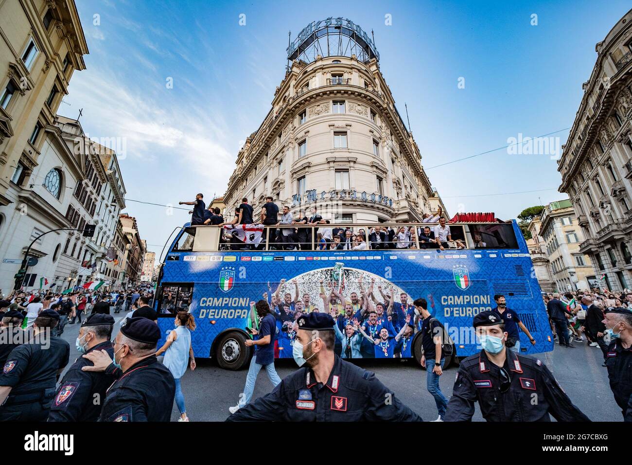 Rome, The open-top coach of the Italian National team passes in via del ...