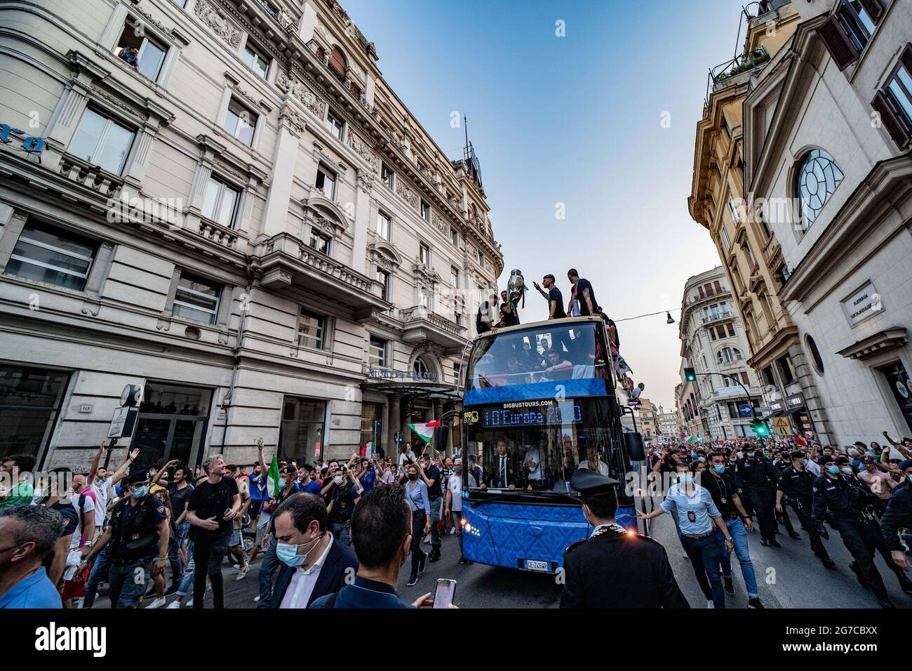 Rome, The open-top coach of the Italian National team passes in via del ...