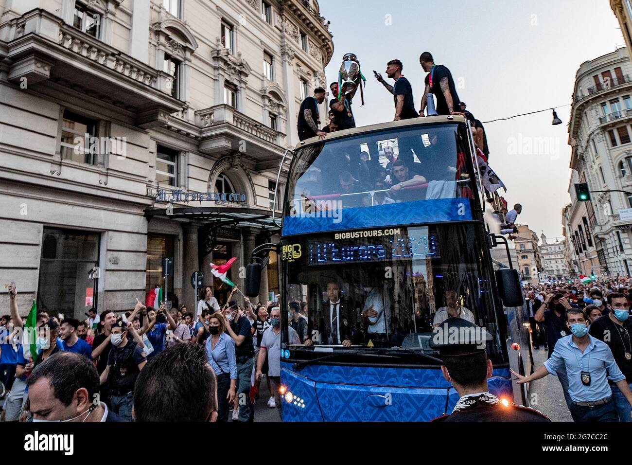 Rome, The open-top coach of the Italian National team passes in via del ...