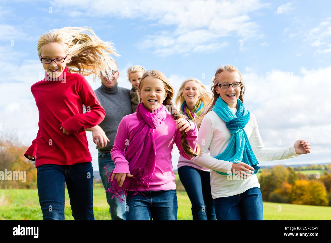 Sporty girls running in park hi-res stock photography and images - Alamy