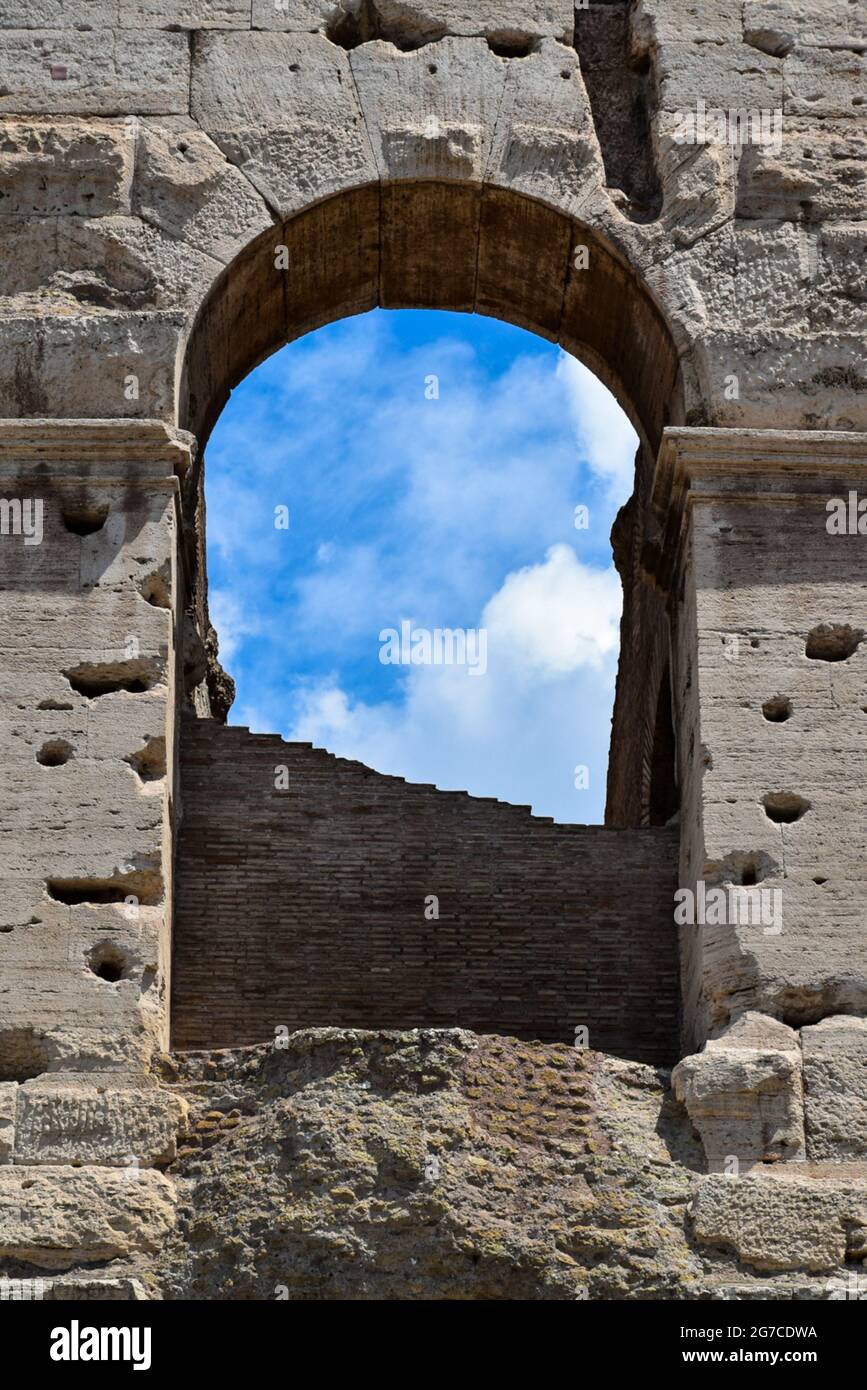 Window of the Colosseum in Rome from which you can see the blue sky ...