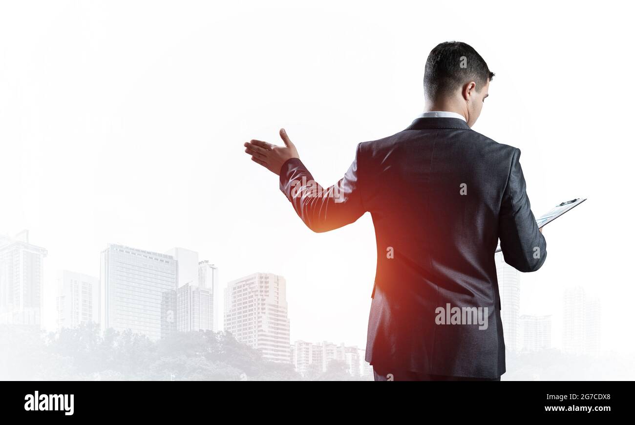 Back view of man in business suit and tie Stock Photo - Alamy