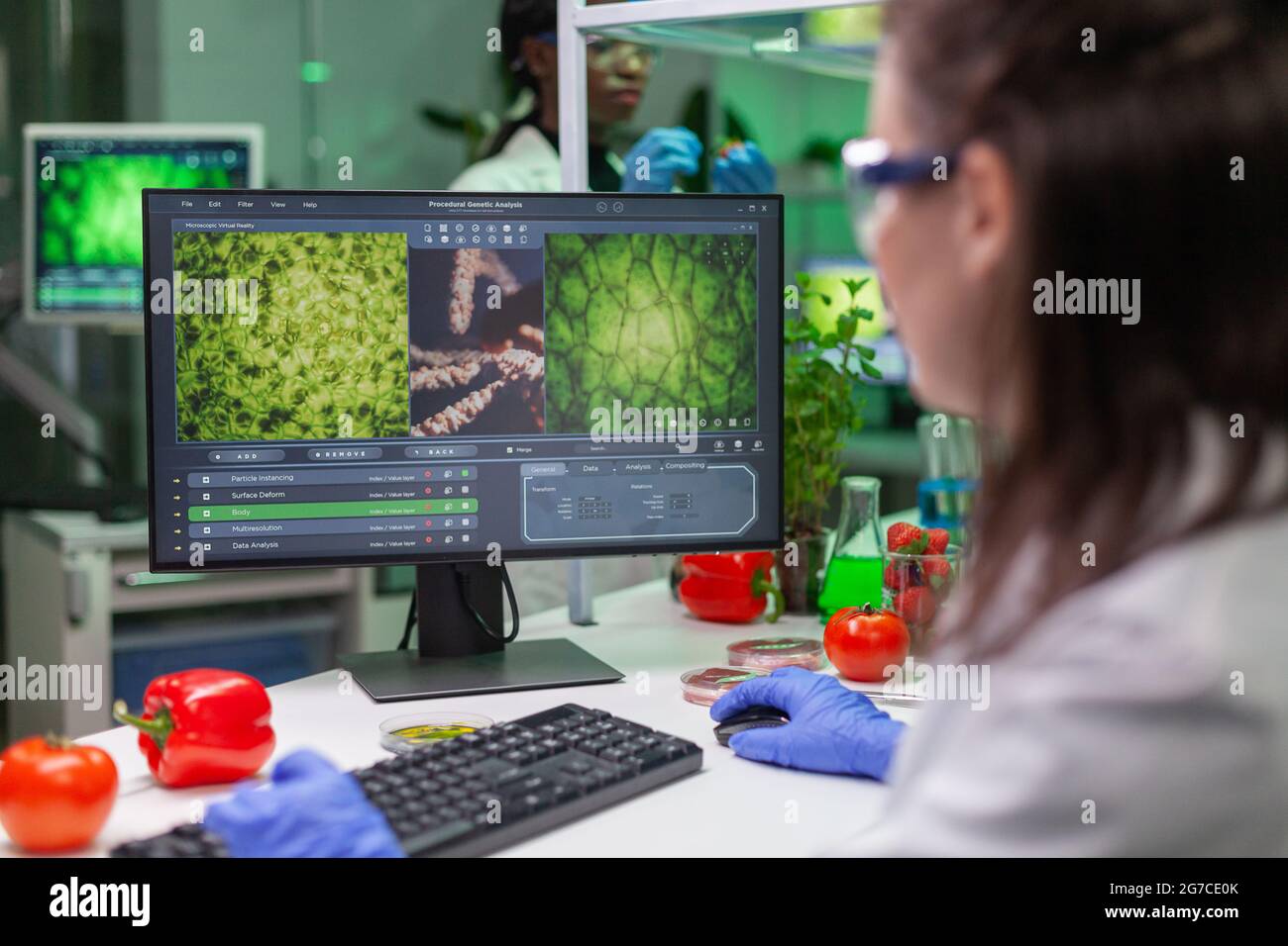 Chemist scientist woman typing biochemistry expertise on computer while ...