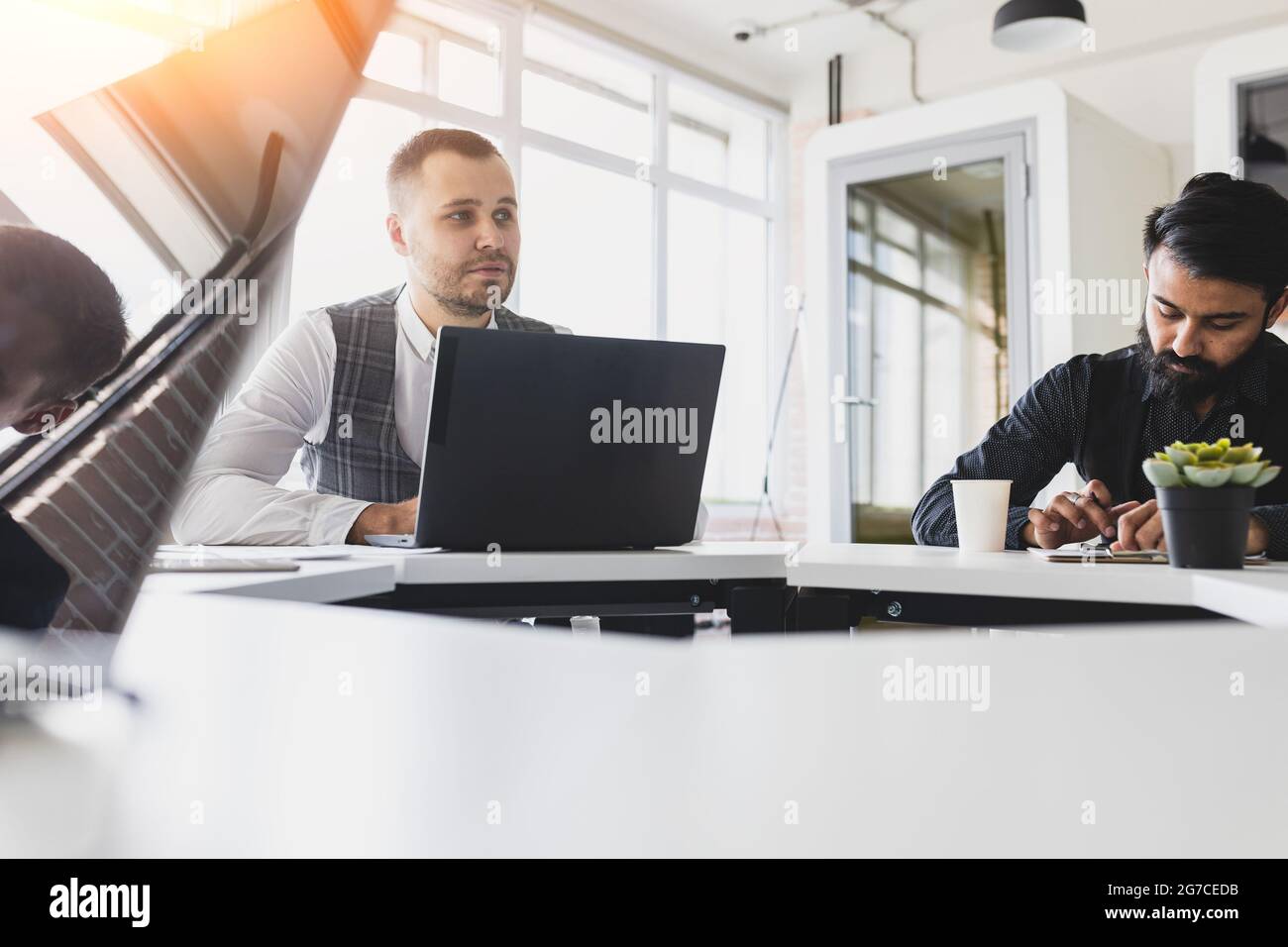 Young businesman in suit wear working in office. Team at work Stock ...