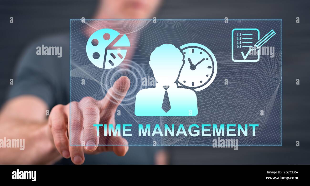 Man touching a time management concept on a touch screen with his ...